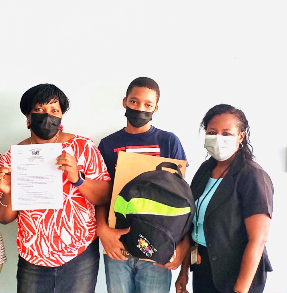 V.I. Access and Visitation Program distributes laptops and backpacks ...